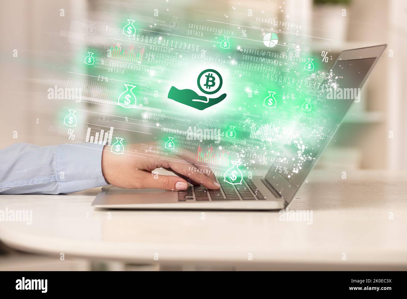 Young man watching stock market on laptop Stock Photo - Alamy