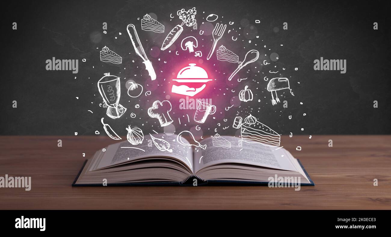 Open recipe book with food related icons above Stock Photo - Alamy