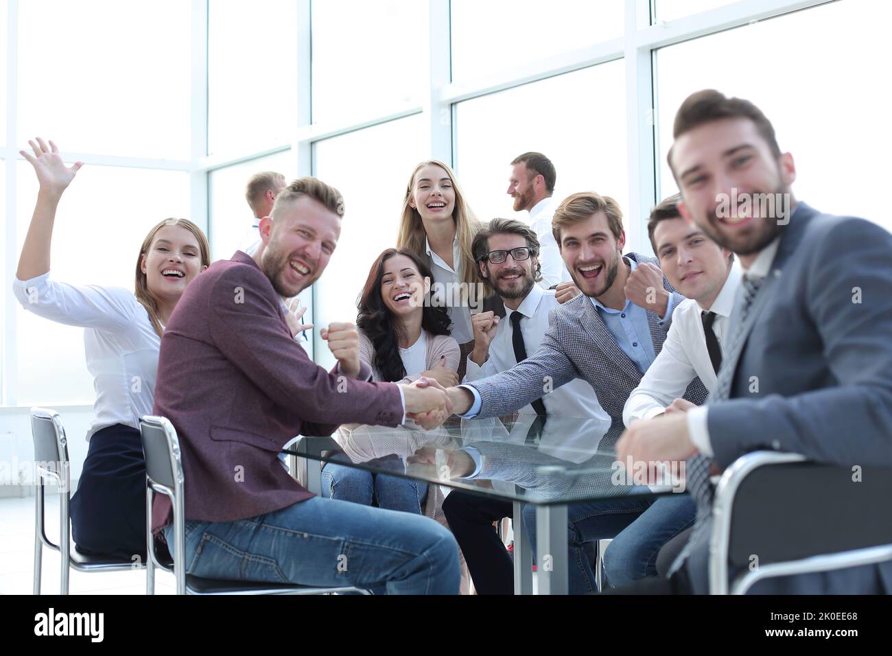 happy business people confirming the transaction with a handshake Stock ...