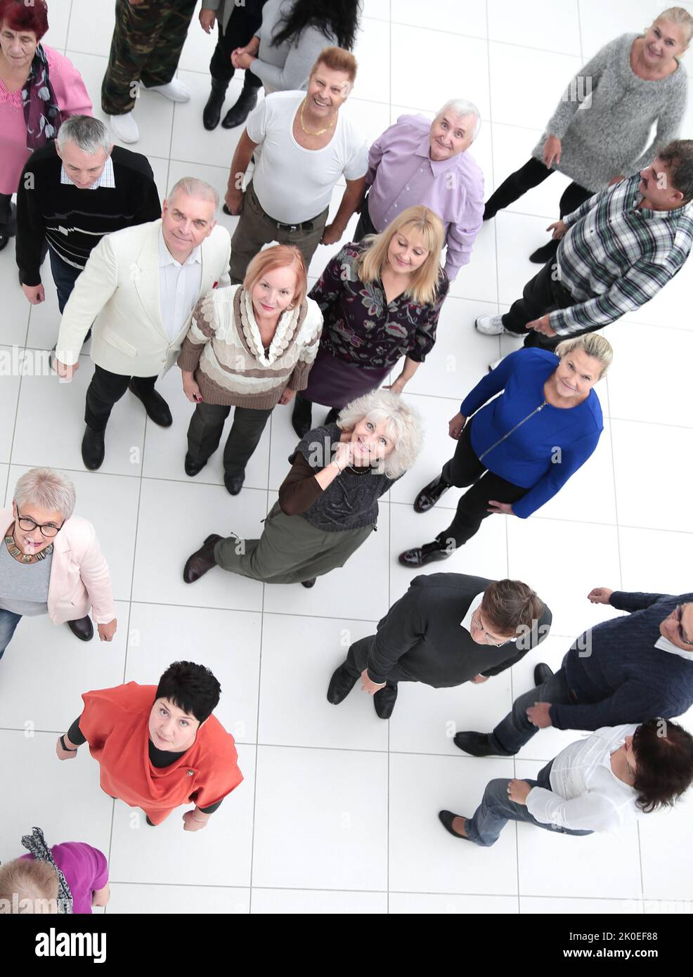 group of casual mature people walking somewhere Stock Photo - Alamy