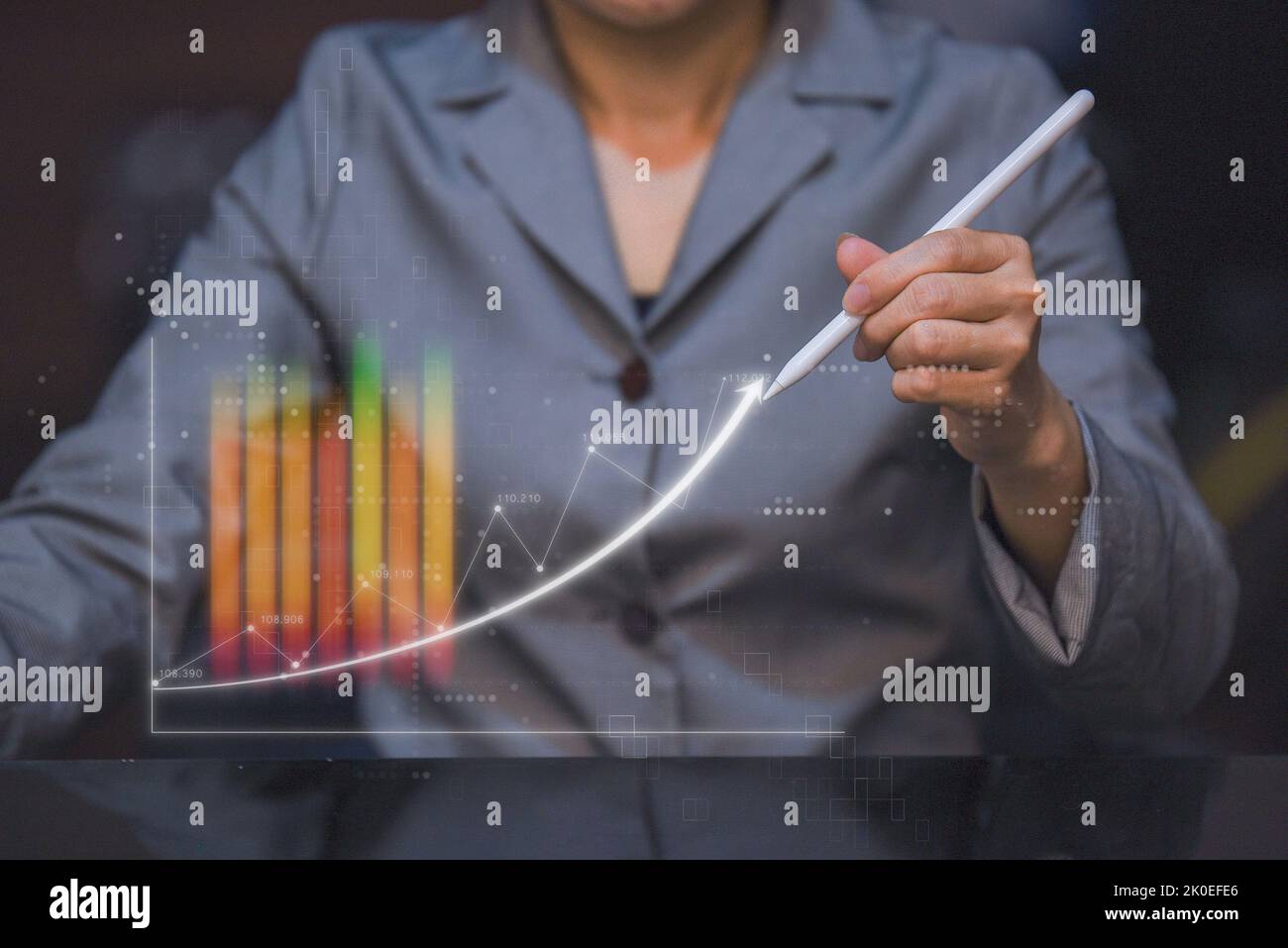 business woman holding digital pencil and touching on top of up trend ...