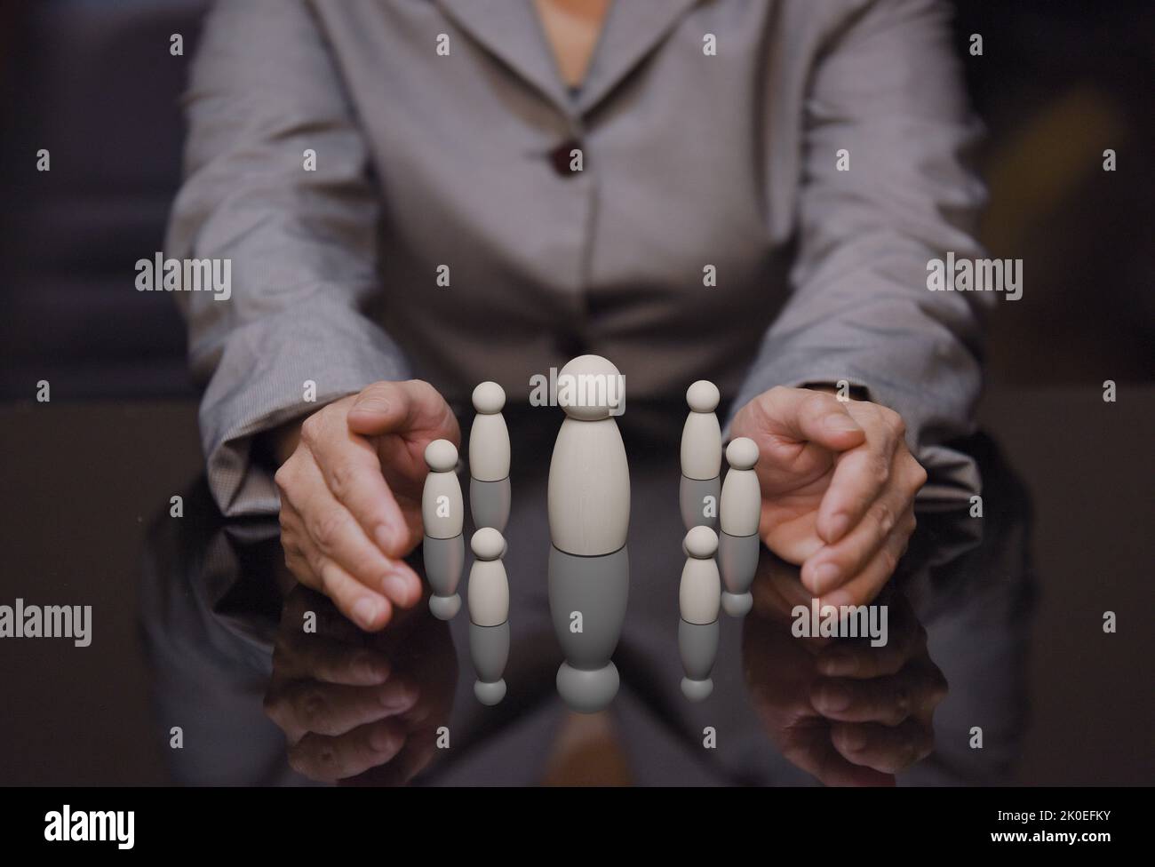 business woman holding wooden human team, working connection and team ...