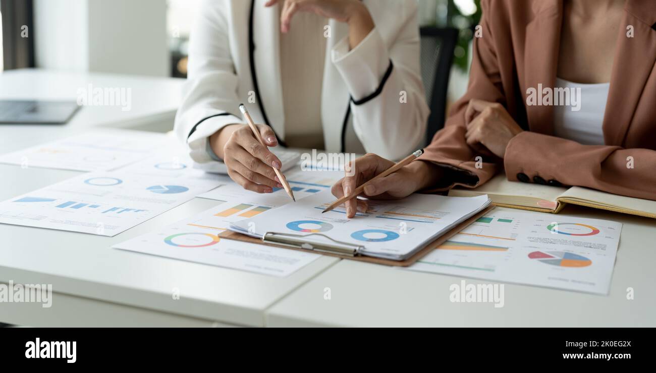 Business team hands at working with financial plan, meeting, discussion, brainstorm on paperwork ...