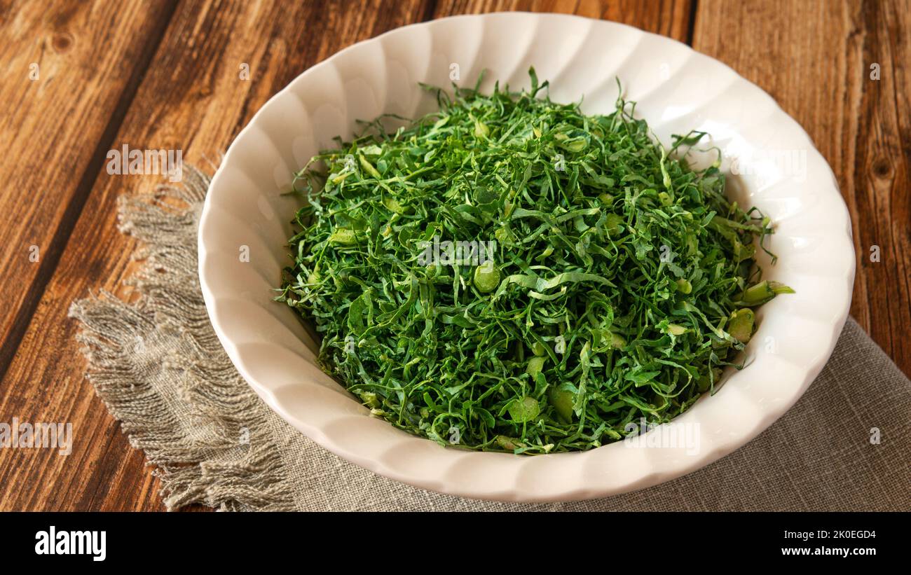 Cabbage julienne for soup called Caldo Verde Stock Photo - Alamy