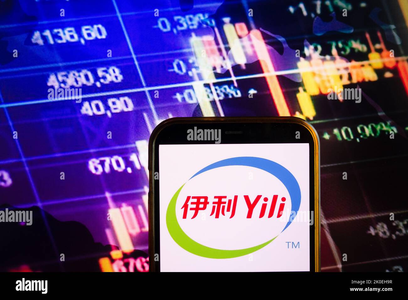 KONSKIE, POLAND - September 10, 2022: Smartphone displaying logo of Yili Group company on stock ...