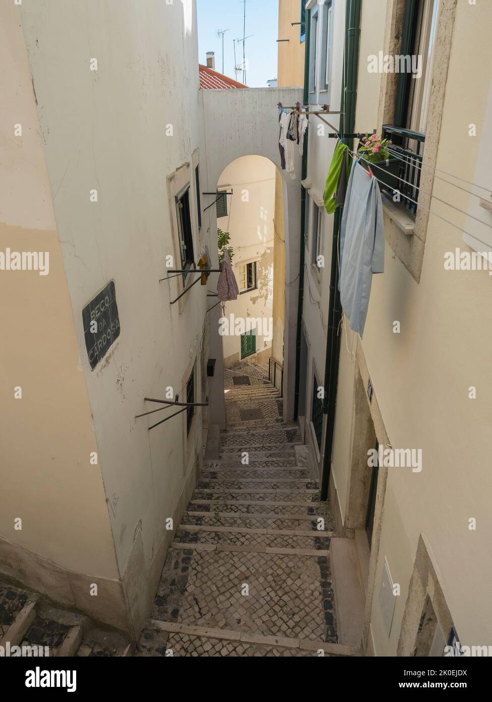 Lisbon, Portugal, October 24, 2021: View of steep narrow Lisbon street ...