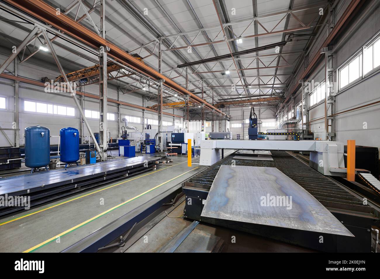 Metal sheets processing workshop with modern equipment Stock Photo - Alamy