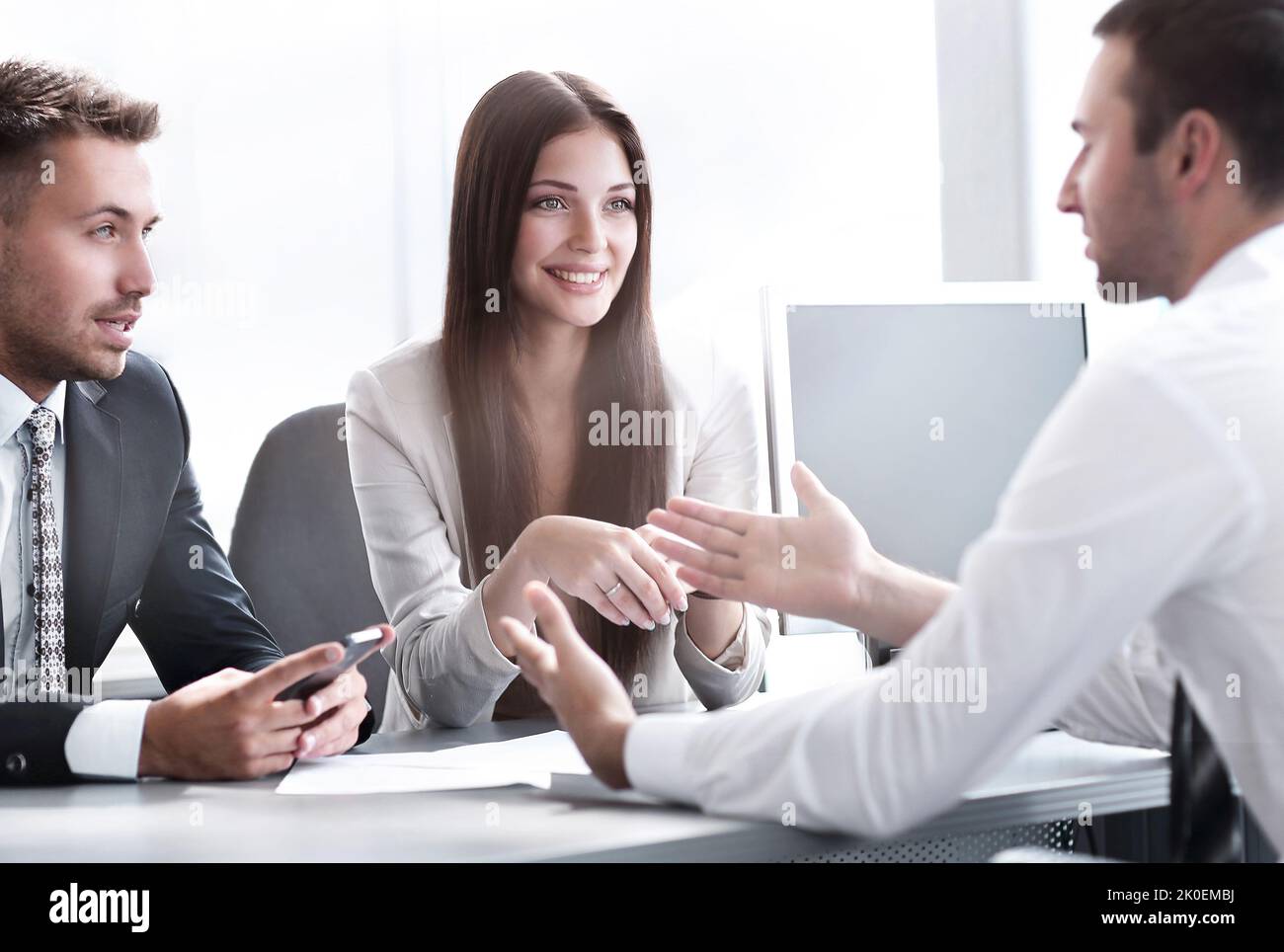 Business team conducts an interview with a young candidate Stock Photo ...