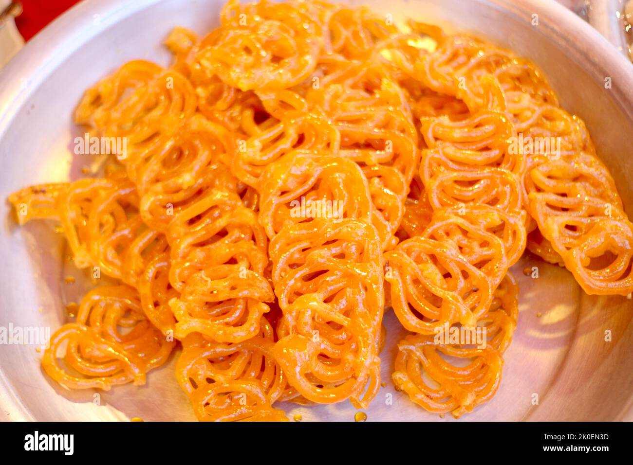 Crispy Sweet Jalebi, Jilapi, zulbia, mushabak or zalabia in white oval ...