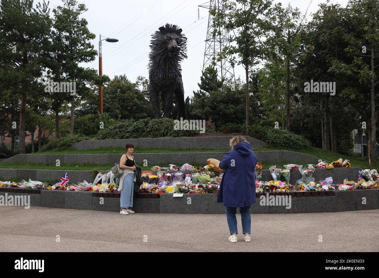 Floral tributes at Aslan statue in CS Lewis Square in east Belfast ...