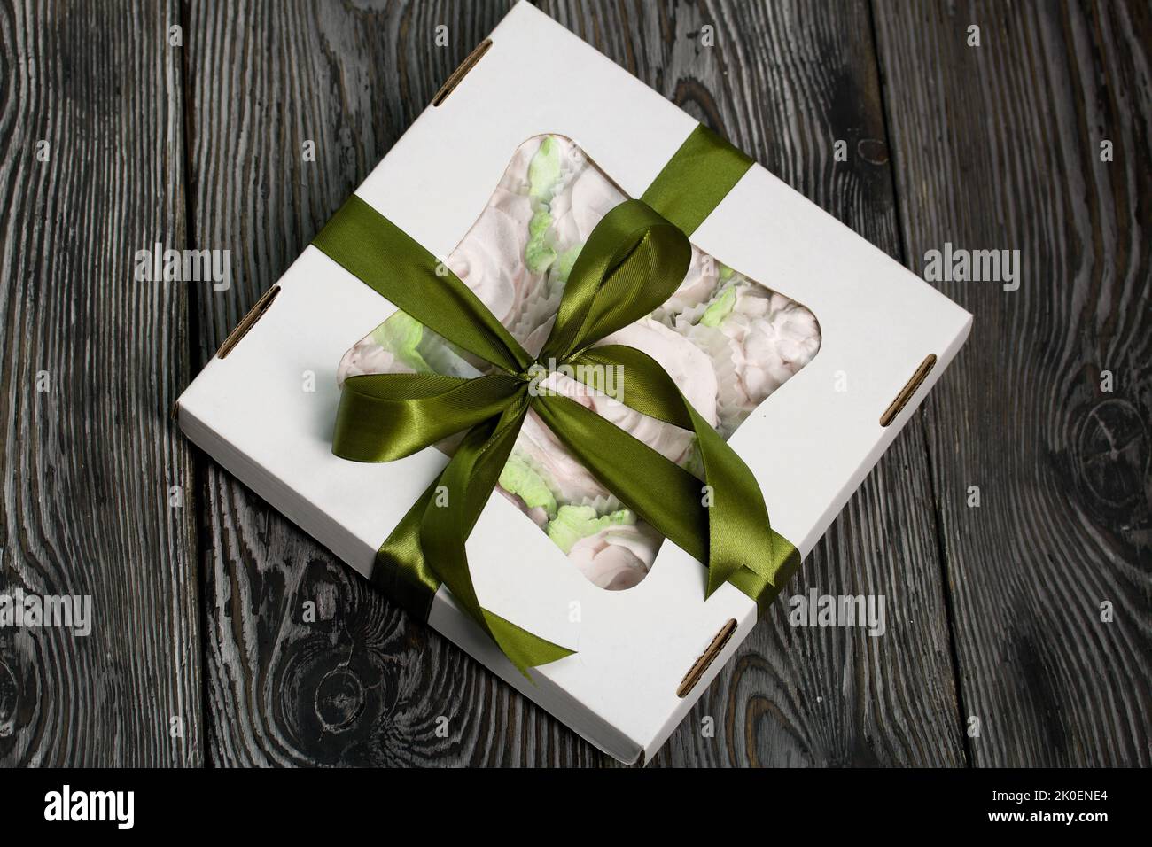 Zephyr flowers. Zephyr in a cardboard box. The box is tied with ribbon ...