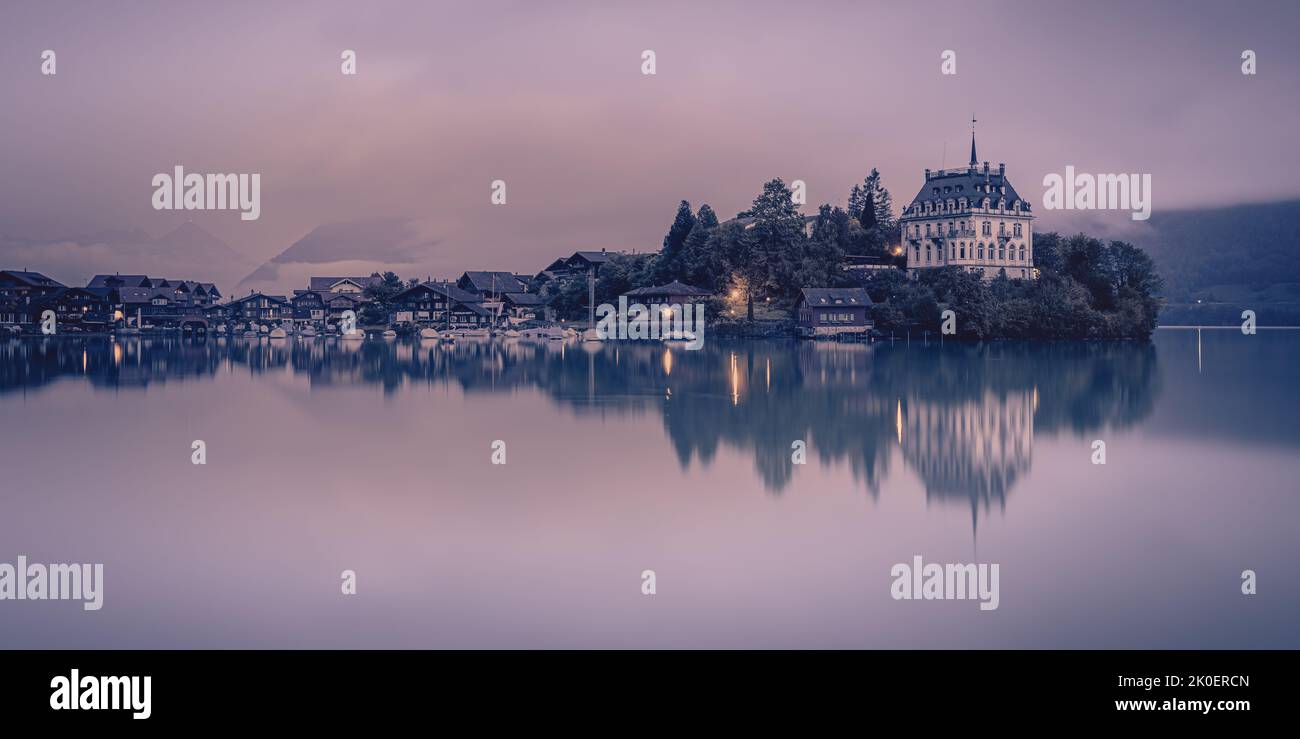 A beautiful early summer morning in Iseltwald, one of Switzerland's ...