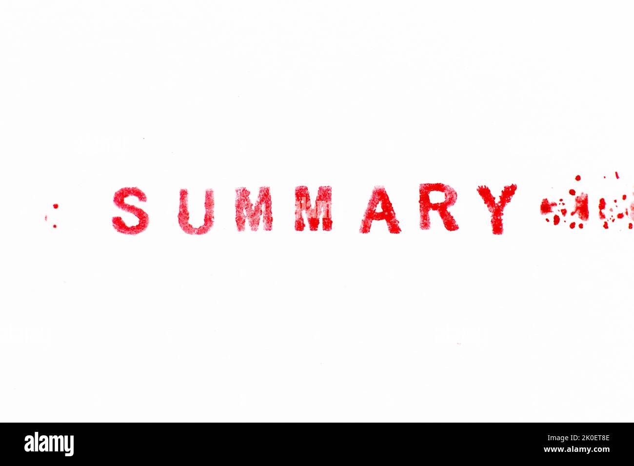 Red color ink rubber stamp in word summary on white paper background ...