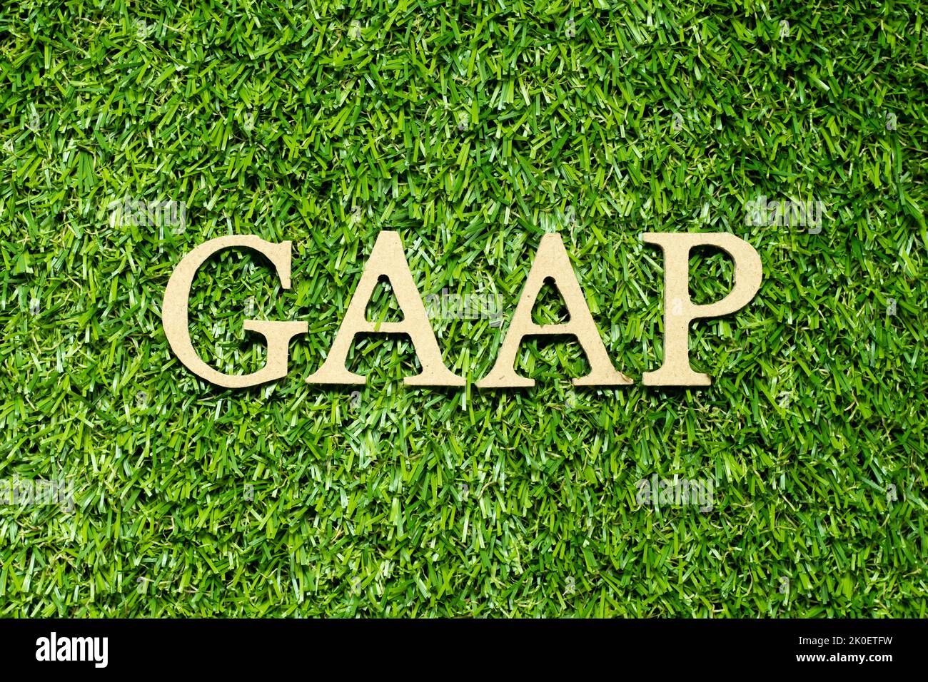 Wood alphabet letter in word GAAP (Abbreviation of Generally accepted ...