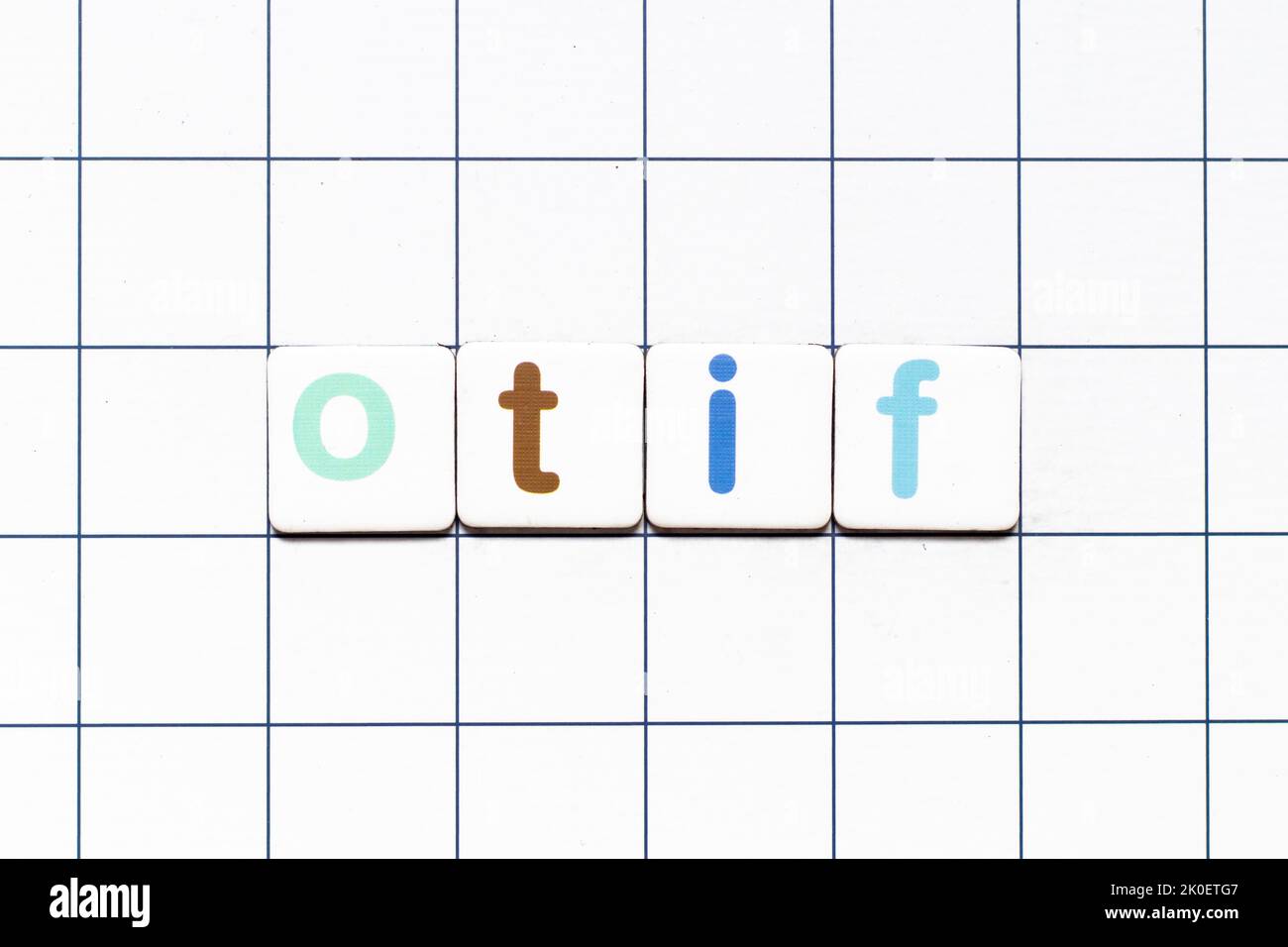 Colorful tile letter in word OTIF (abbreviation of On Time In Full) on ...