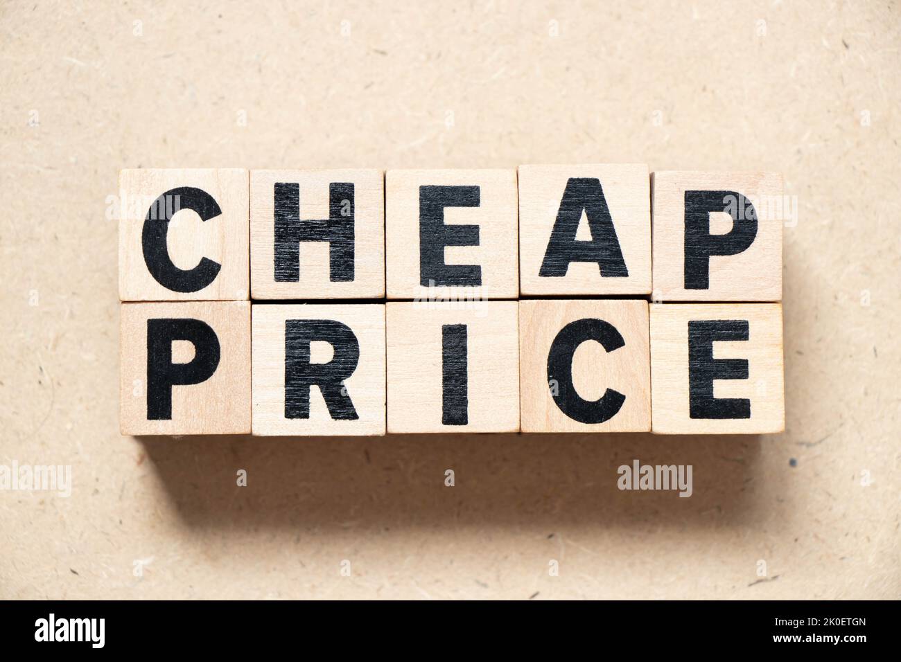 Alphabet letter block in word cheap price on wood background Stock ...