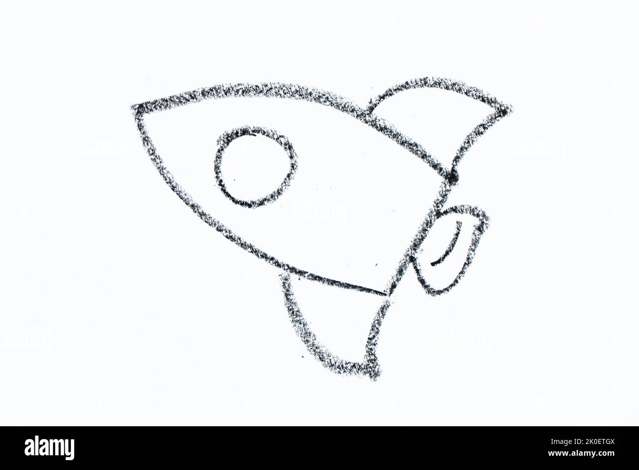 Black color oil pastel hand drawing in spaceship or rocket shape on ...