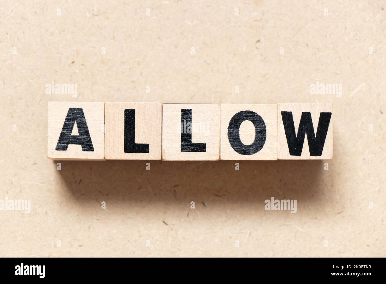 Alphabet letter block in word allow on wood background Stock Photo - Alamy