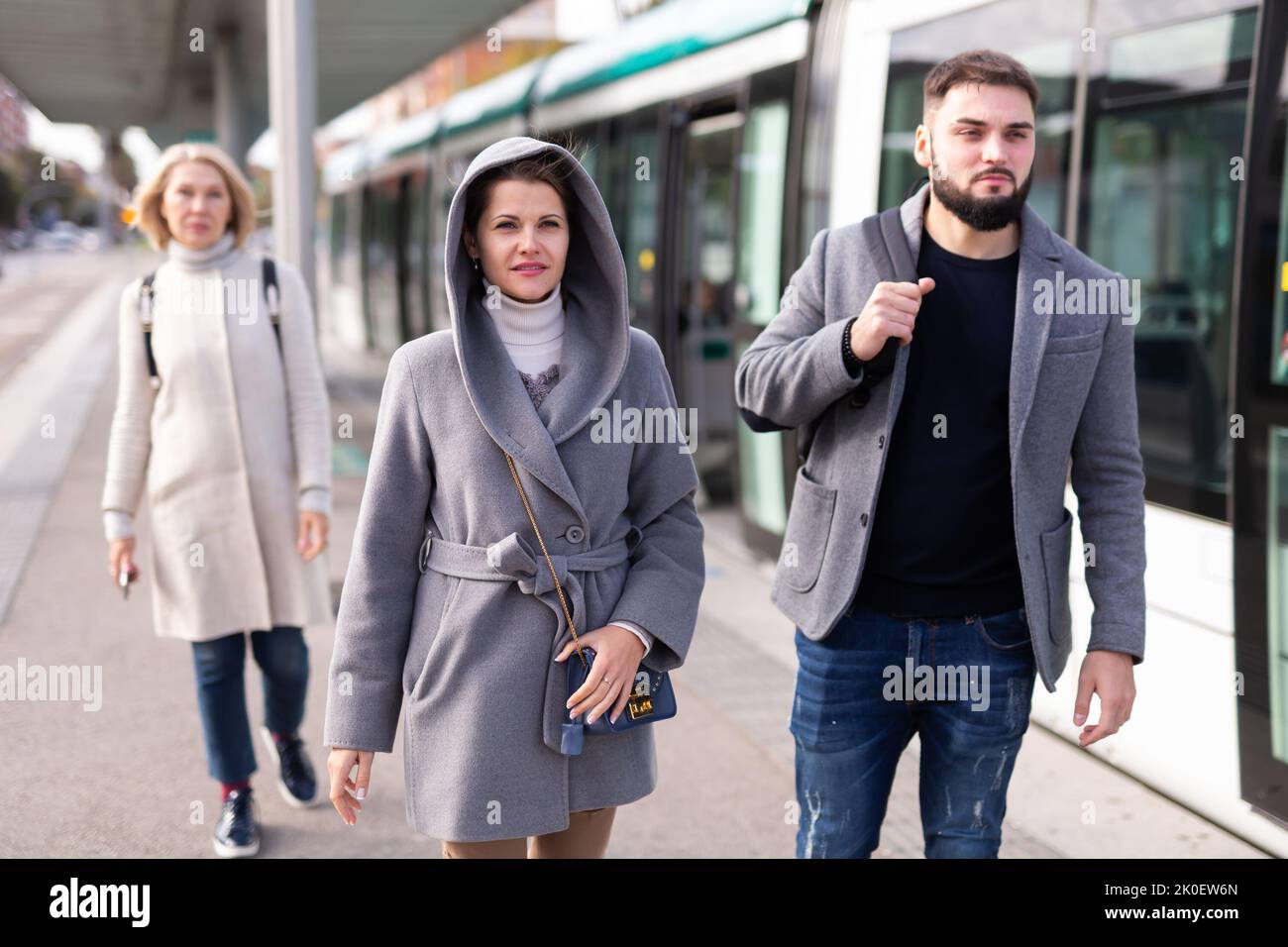 People in hurry to get on tram Stock Photo - Alamy