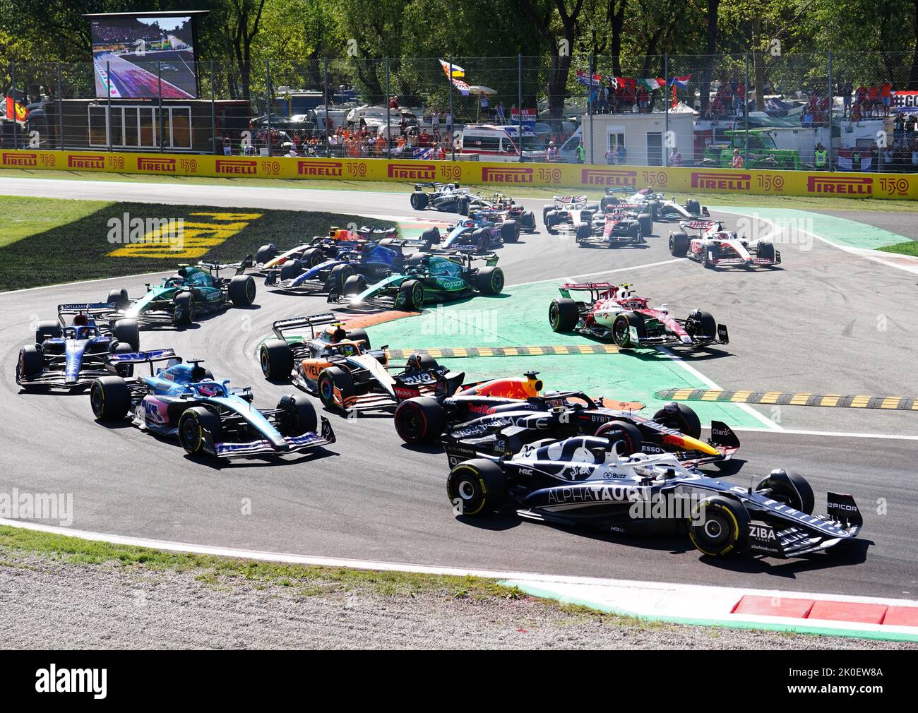 AlphaTauri's Pierre Gasly (right) at the chicane after the start of the ...