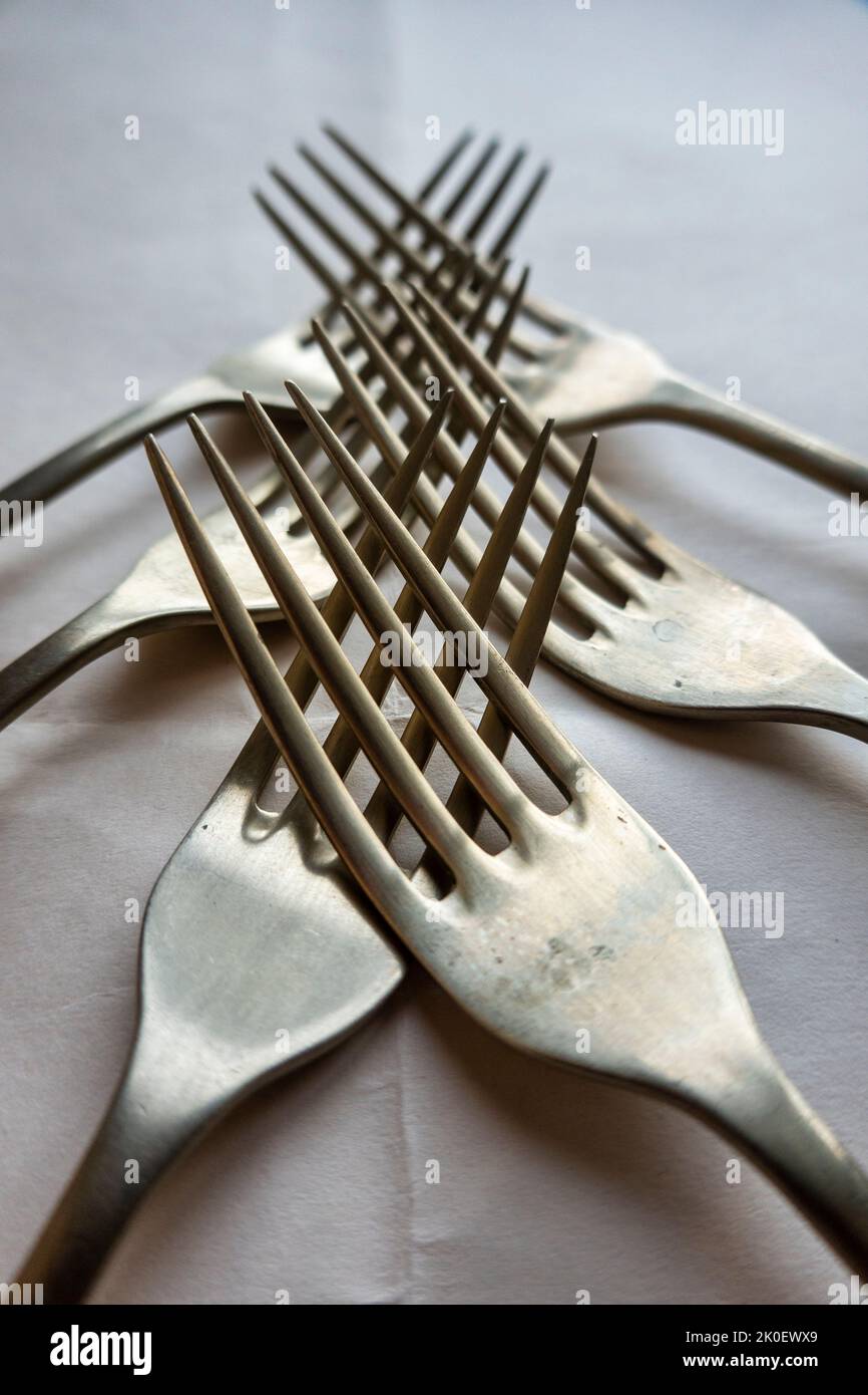 Crossed forks hi-res stock photography and images - Alamy