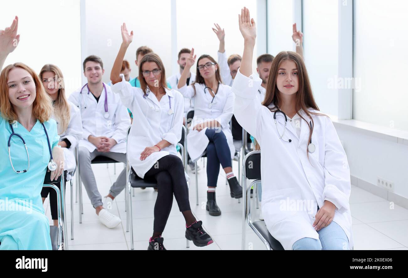 top view. a group of smiling doctors pointing at you Stock Photo - Alamy