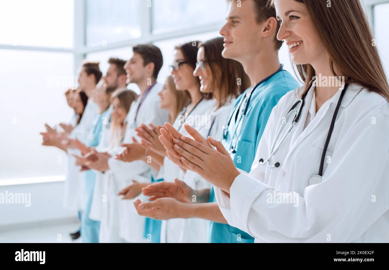 top view. a group of smiling doctors pointing at you Stock Photo - Alamy