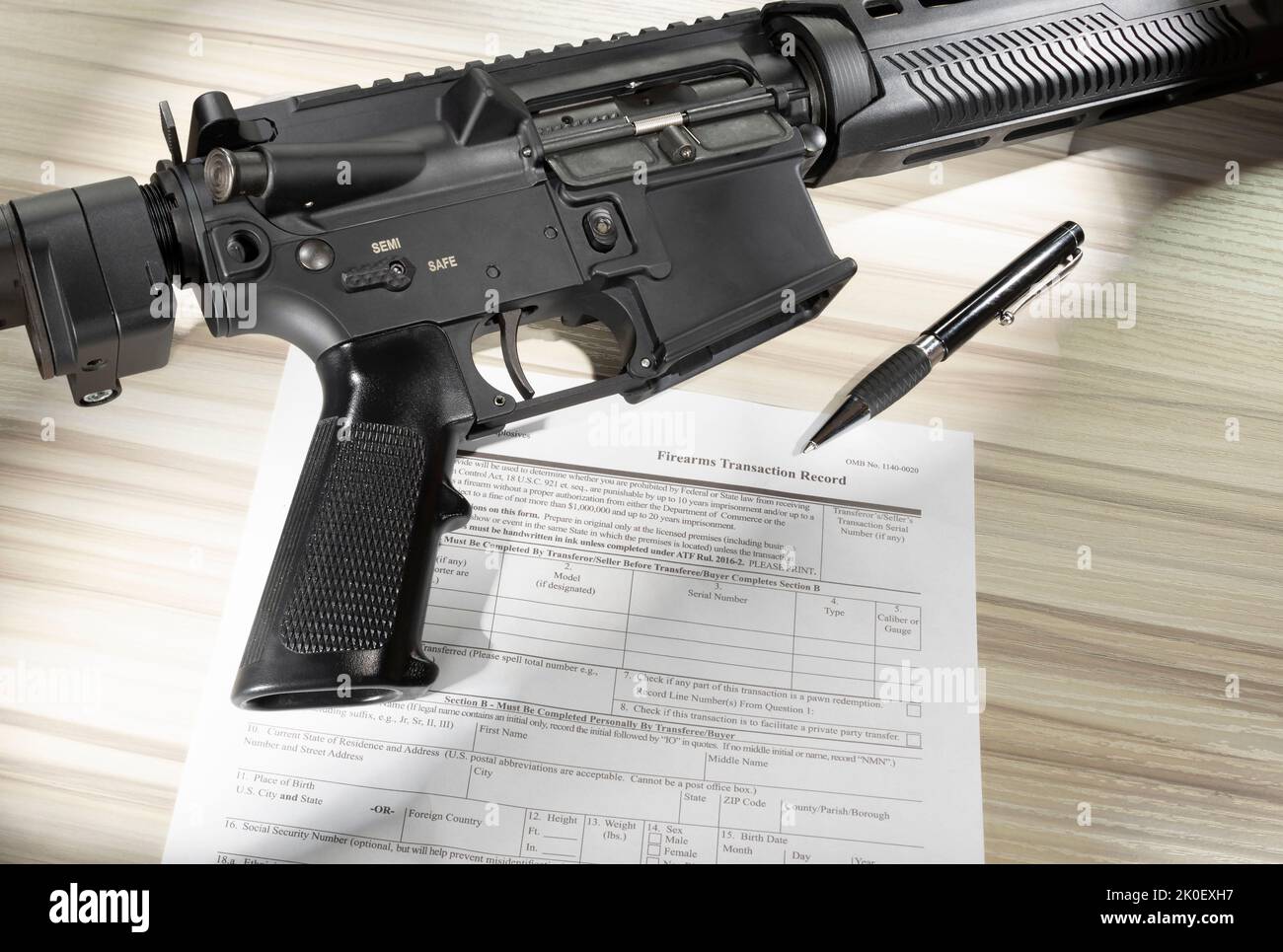 Weapon and public domain background check form for its purchase Stock ...