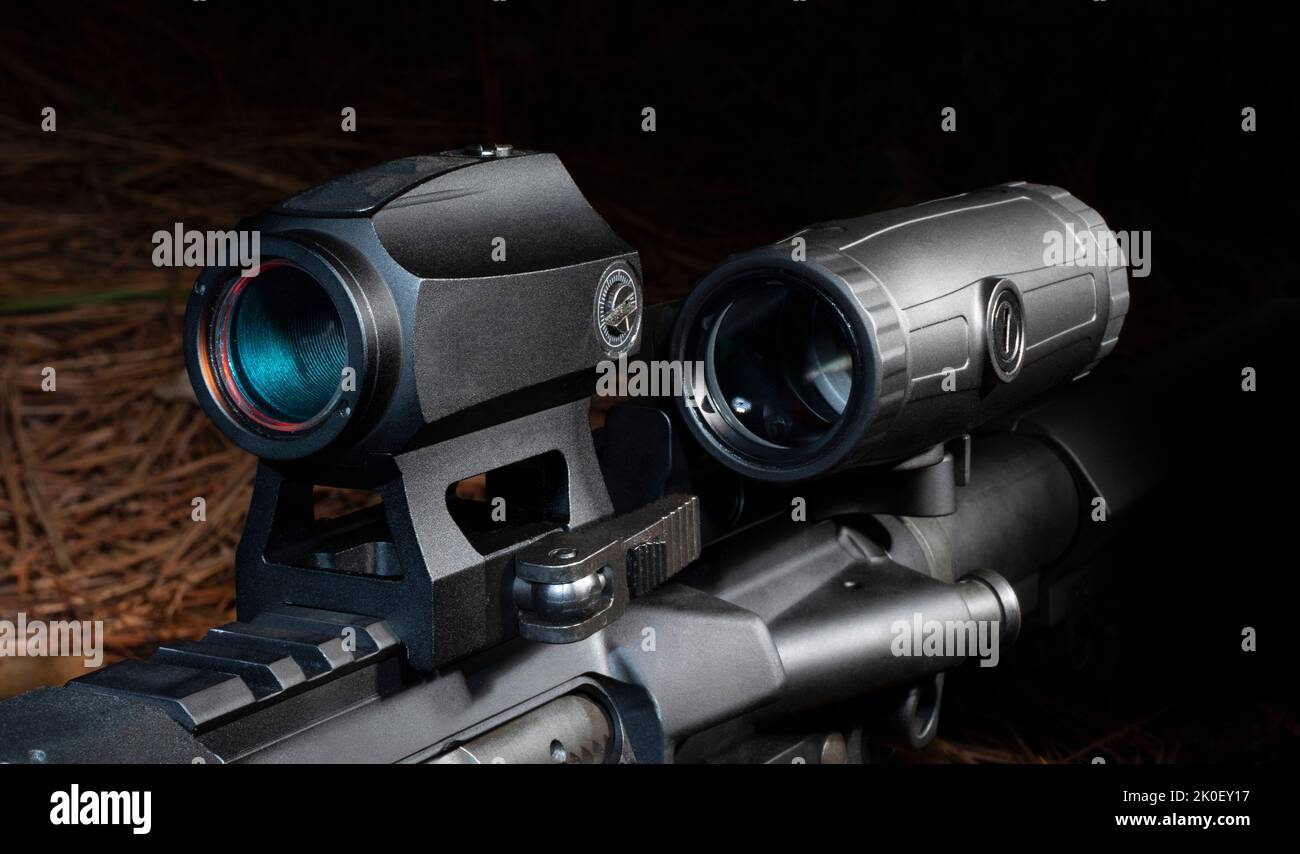 Magnifier on the side of a red dot scope on an AR-15 Stock Photo - Alamy