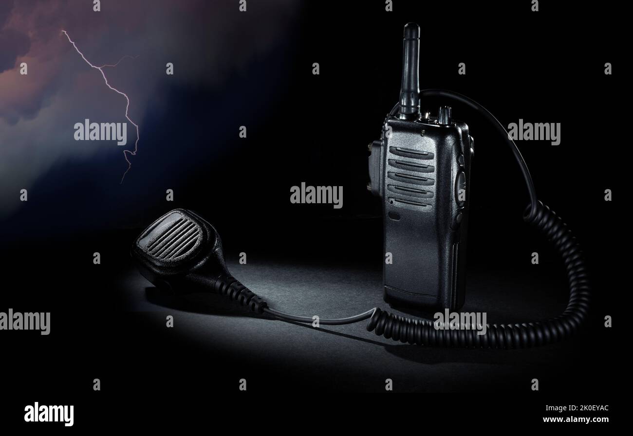 Lightning striking behind an emergency radio and microphone Stock Photo ... Lightning striking behind an emergency radio and microphone Stock Photo ...