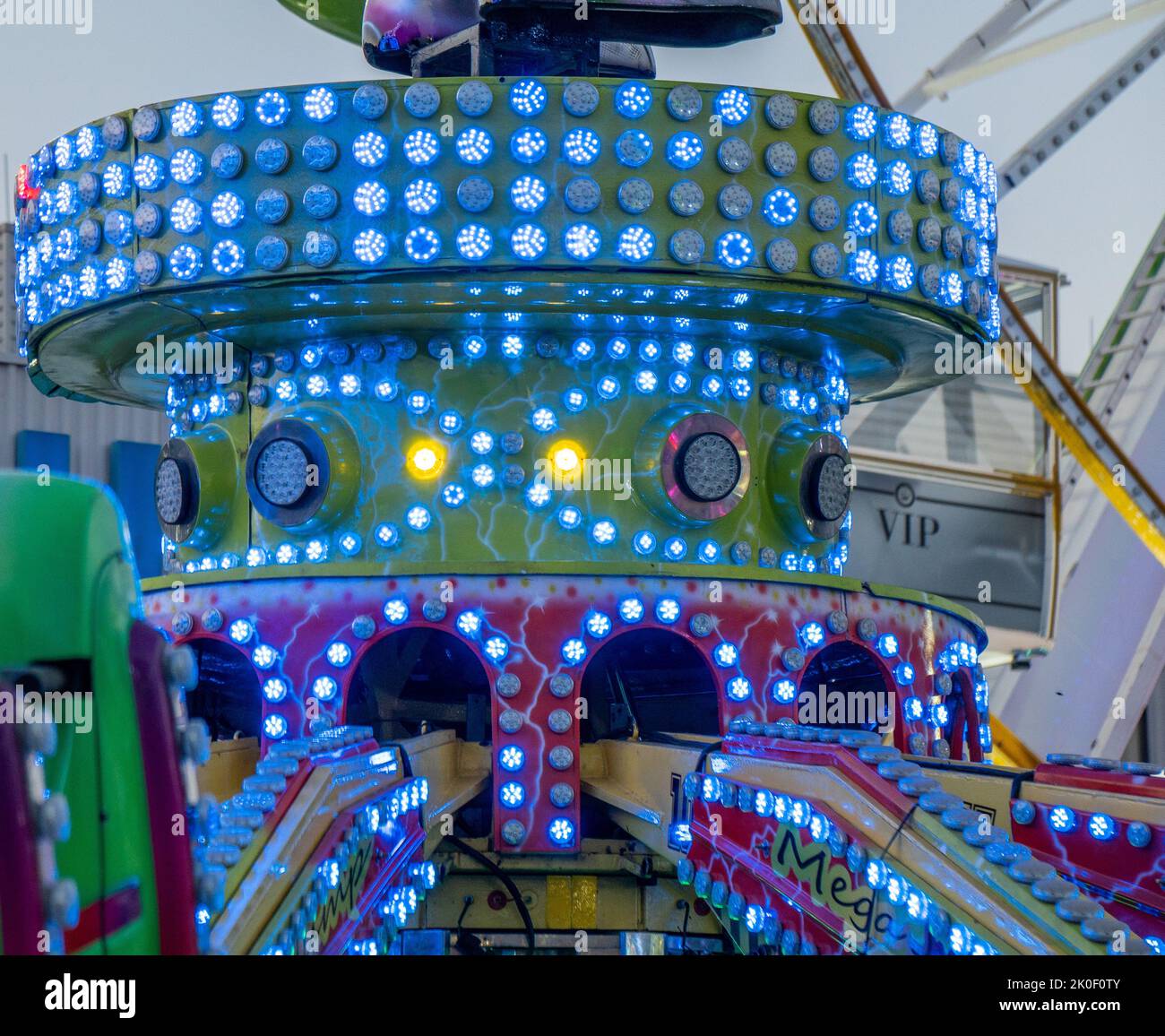 Detail of led lights on and off of a colorful fairground attraction in ...