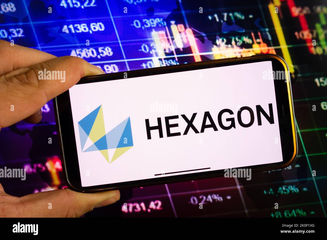 KONSKIE, POLAND - September 10, 2022: Smartphone displaying logo of Hexagon company on stock ...