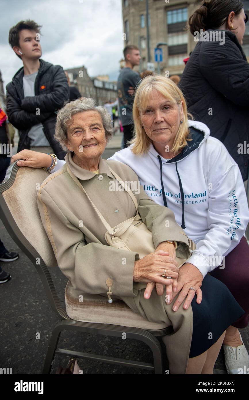 Nan Houston age 92 and her daughter Alison wait for the hearse carrying ...