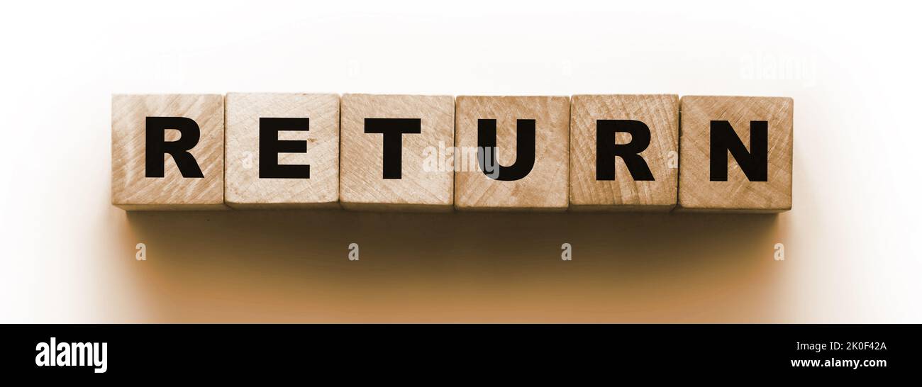 wooden blocks for word RETURN. Risk management and risk tolerance ...