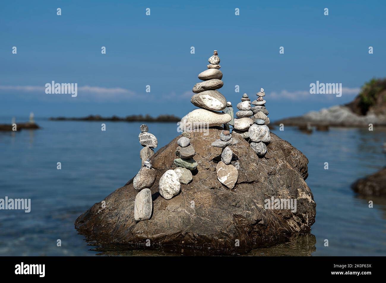 balanced stones on the rocks of the sea Stock Photo - Alamy