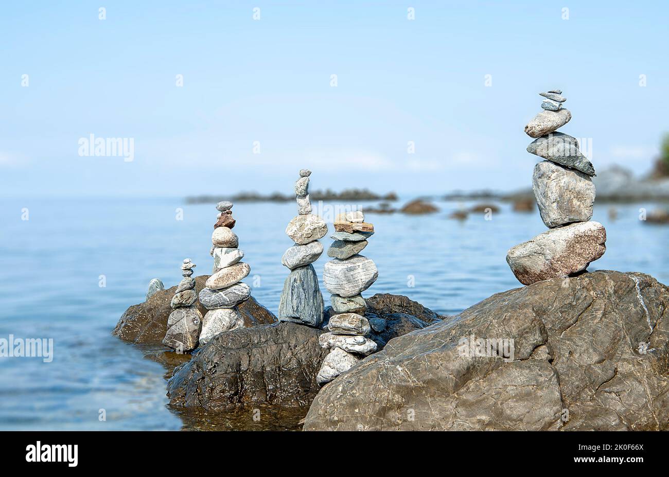 balanced stones on the rocks of the sea Stock Photo - Alamy