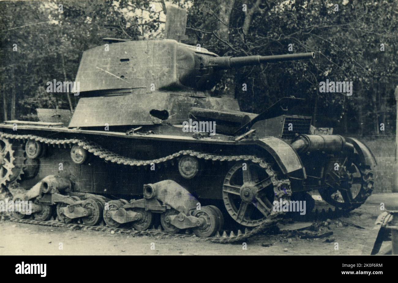 Destroyed Soviet T-26 light tank of the Red Army, in battles against ...