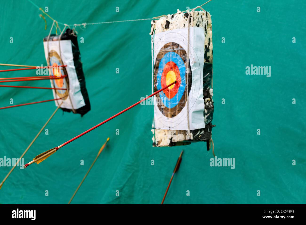 Defocus arrow in target. Hit goal ring in archery target vintage style ...