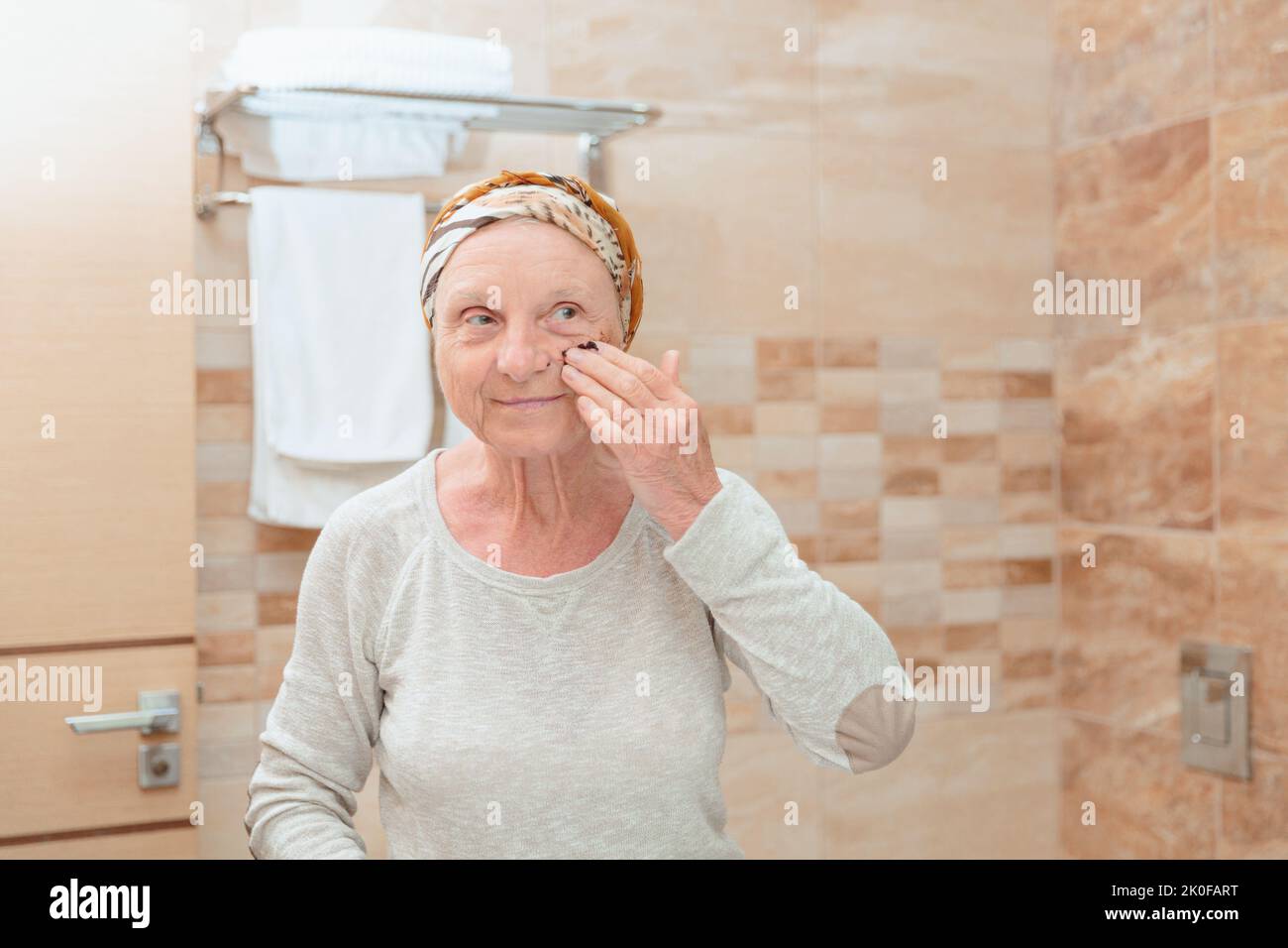 Senior woman taking anti hi-res stock photography and images - Alamy