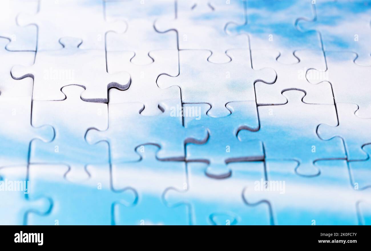 Puzzle. Piece of a puzzle with many pieces. The concept of a whole made ...