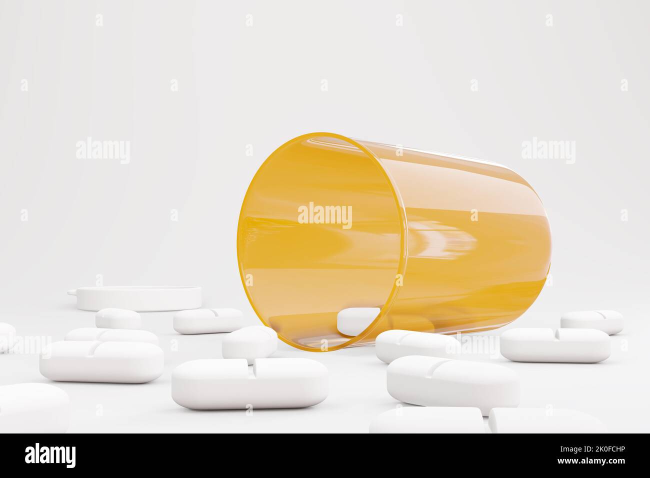 Orange pill bottle scattering tablets across the white background ...