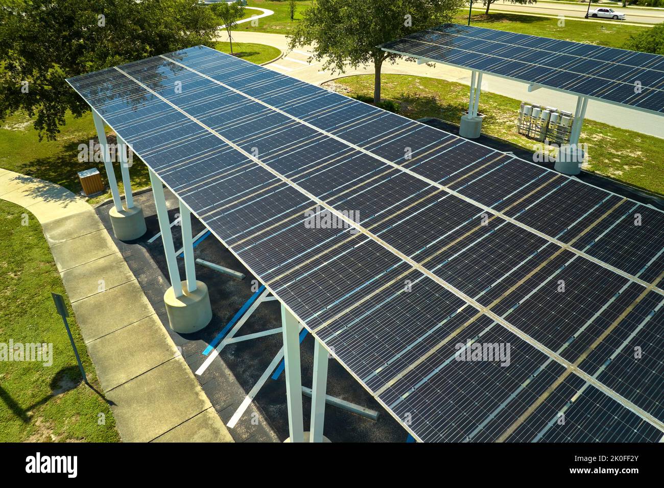 Aerial view of solar panels installed as shade roof over parking lot ...