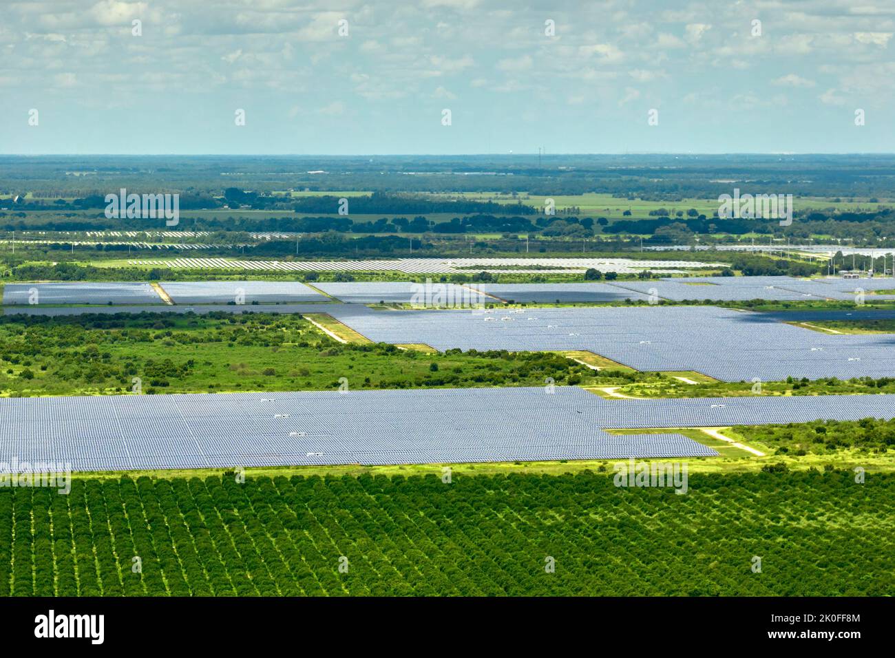 Aerial view of sustainable electric power plant between agricultural ...