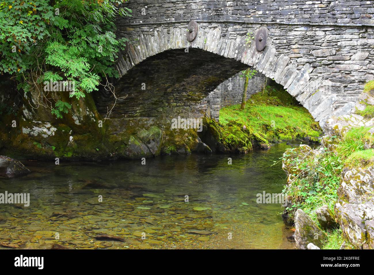 Old stone bridge over Great Langdale Beck in Elterwater, Lake District ...