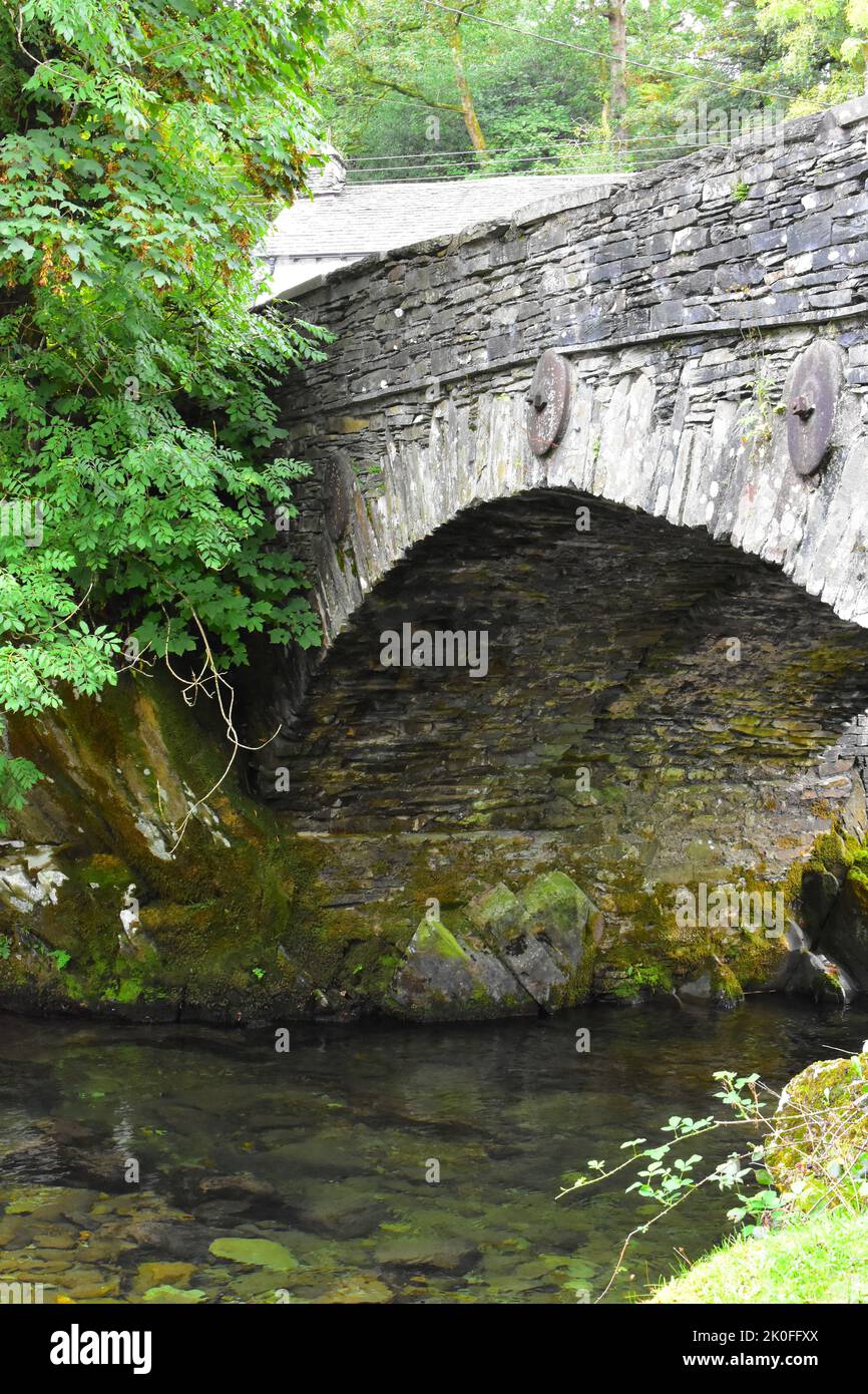 Old stone bridge over Great Langdale Beck in Elterwater, Lake District ...