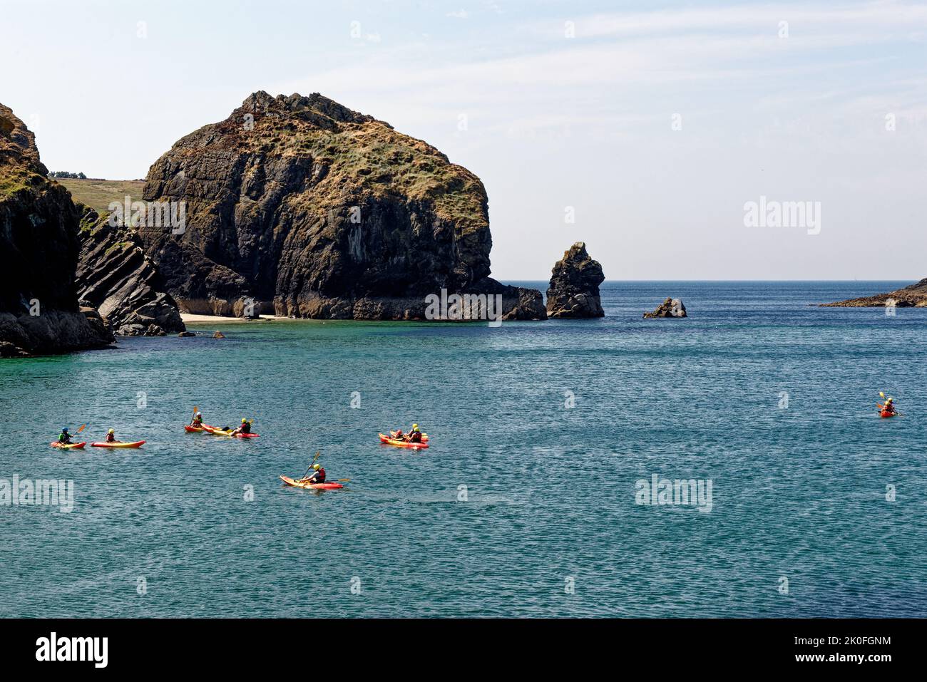kayaking in Historic harbour at Mullion Cove in Mounts Bay Cornwall ...