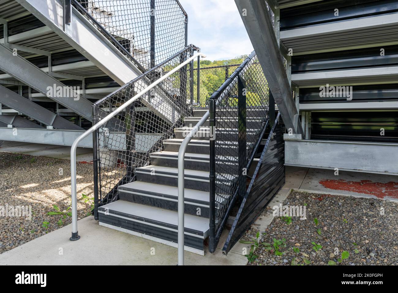 Example of an exit, entrance, vomitorium at empty set of metal stadium ...