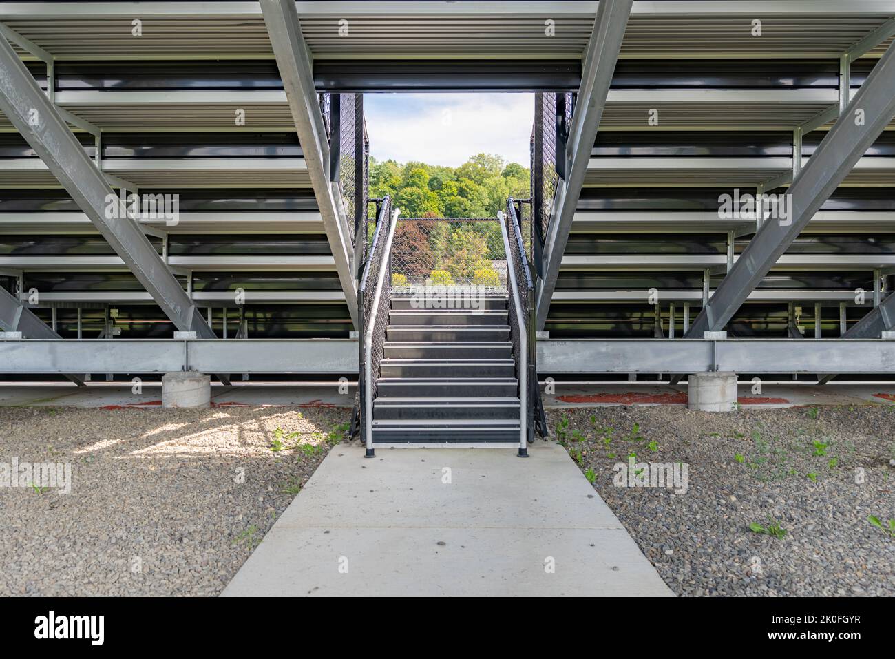 Example of an exit, entrance, vomitorium at empty set of metal stadium ...