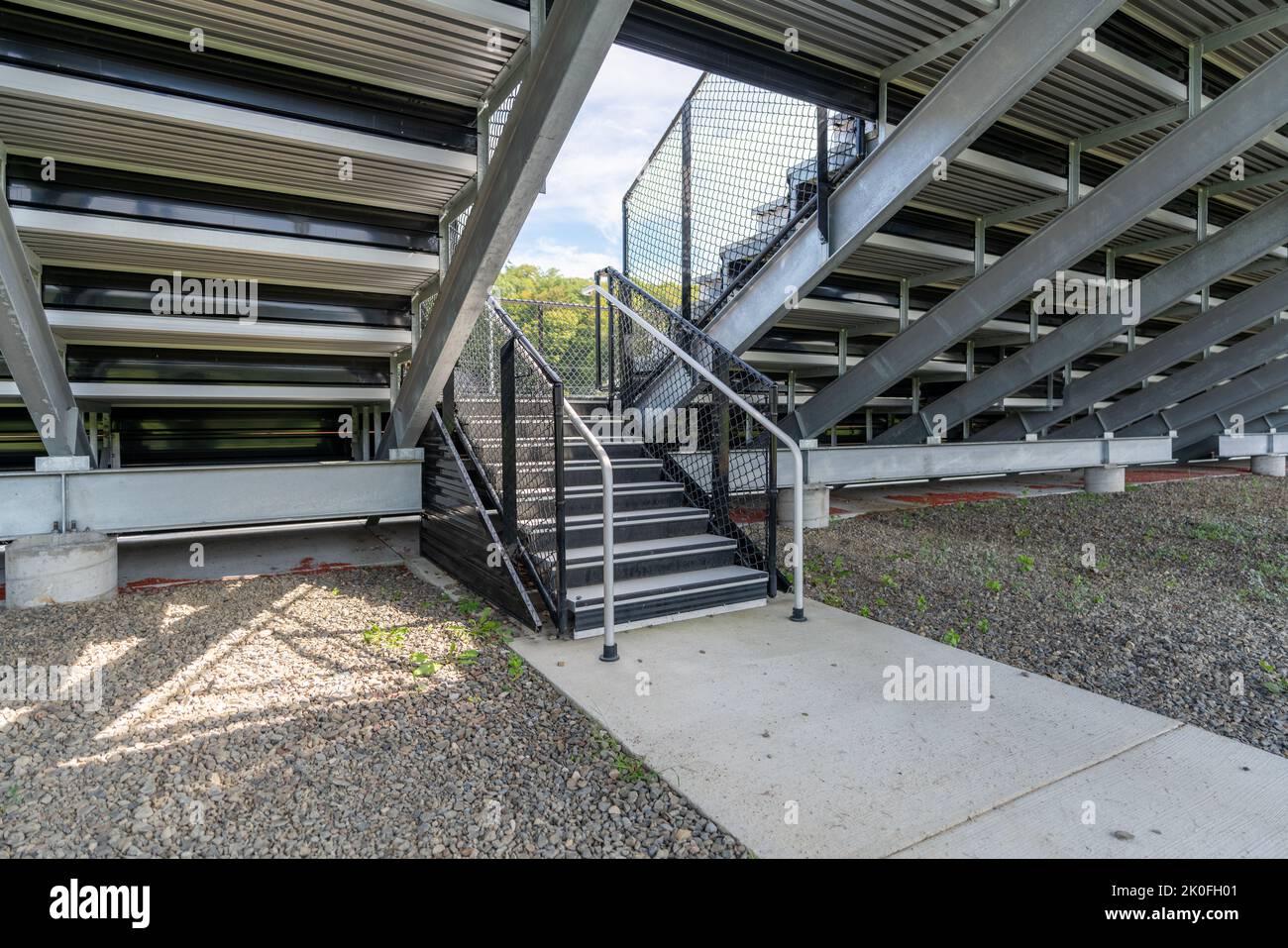 Example of an exit, entrance, vomitorium at empty set of metal stadium ...