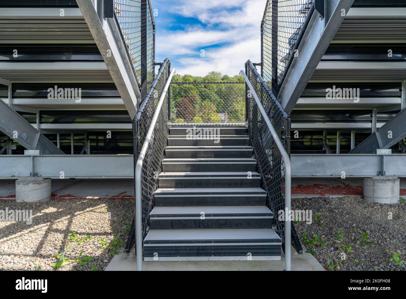 Example of an exit, entrance, vomitorium at empty set of metal stadium ...